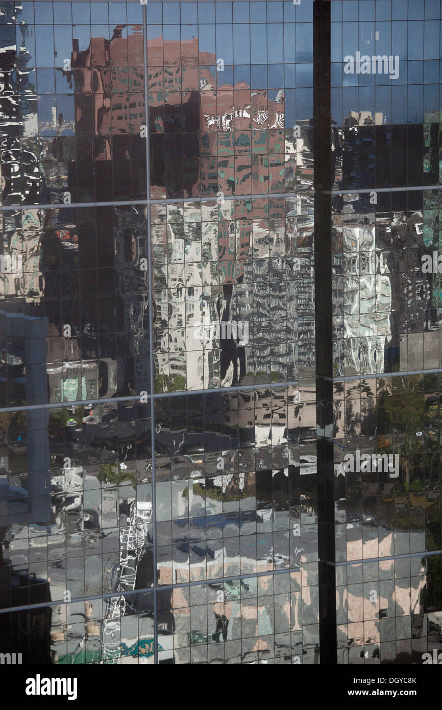 Distorted reflections of city skyscraper in Melbourne, Victoria ...