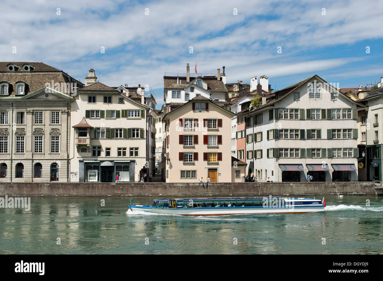 A boat on the Limmat river, historic district, Zurich, Switzerland ...