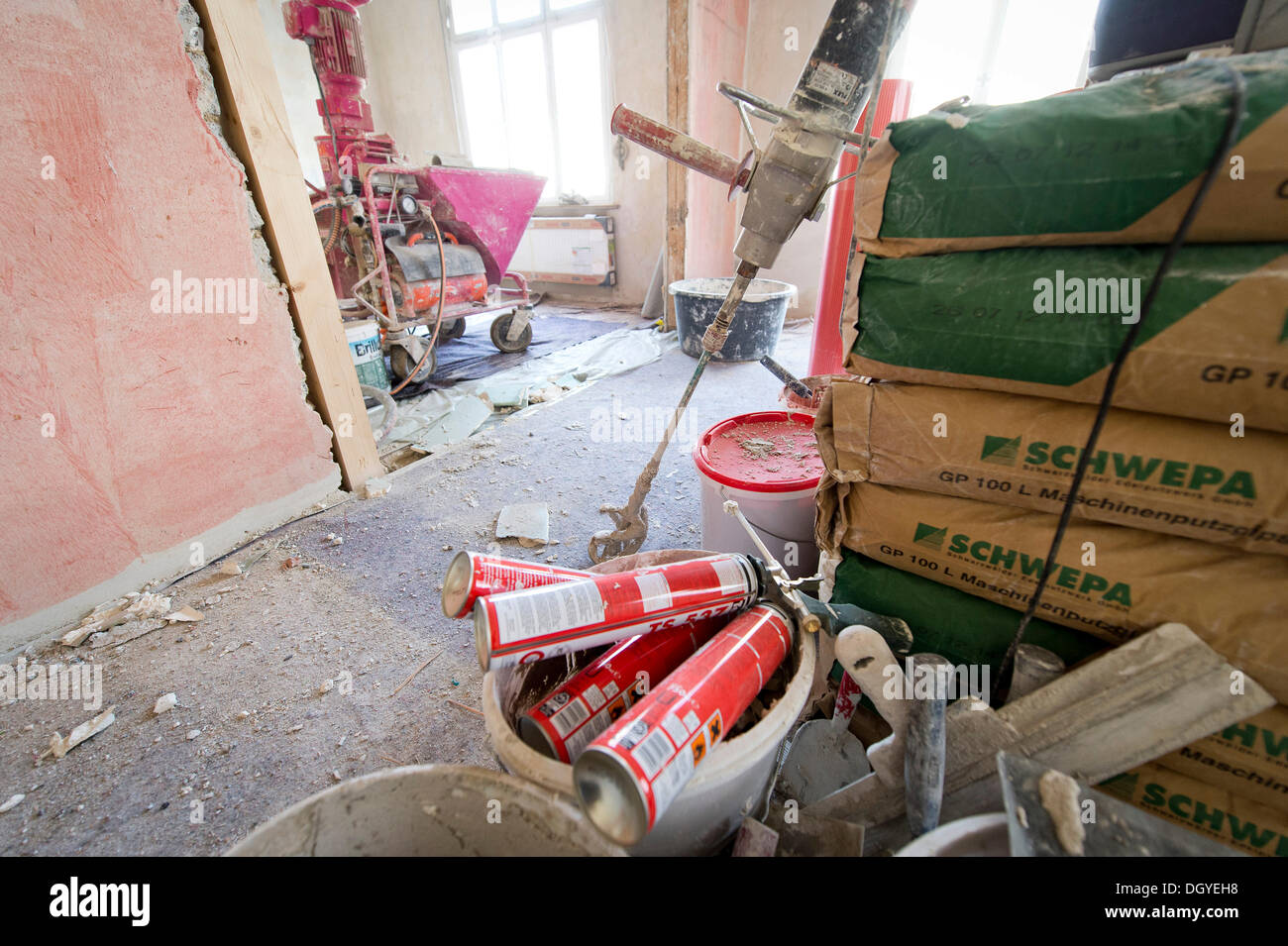 Plastering machine for plastering interior walls, bags of plaster for ...