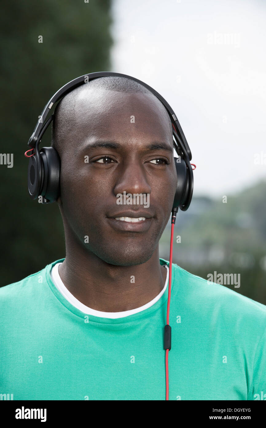 Handsome man listening beautiful hi-res stock photography and images - Alamy