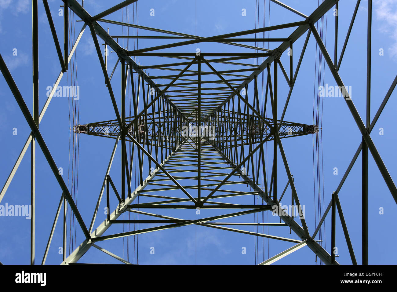 Electricity pylon from below, power supply and energy topic Stock Photo ...
