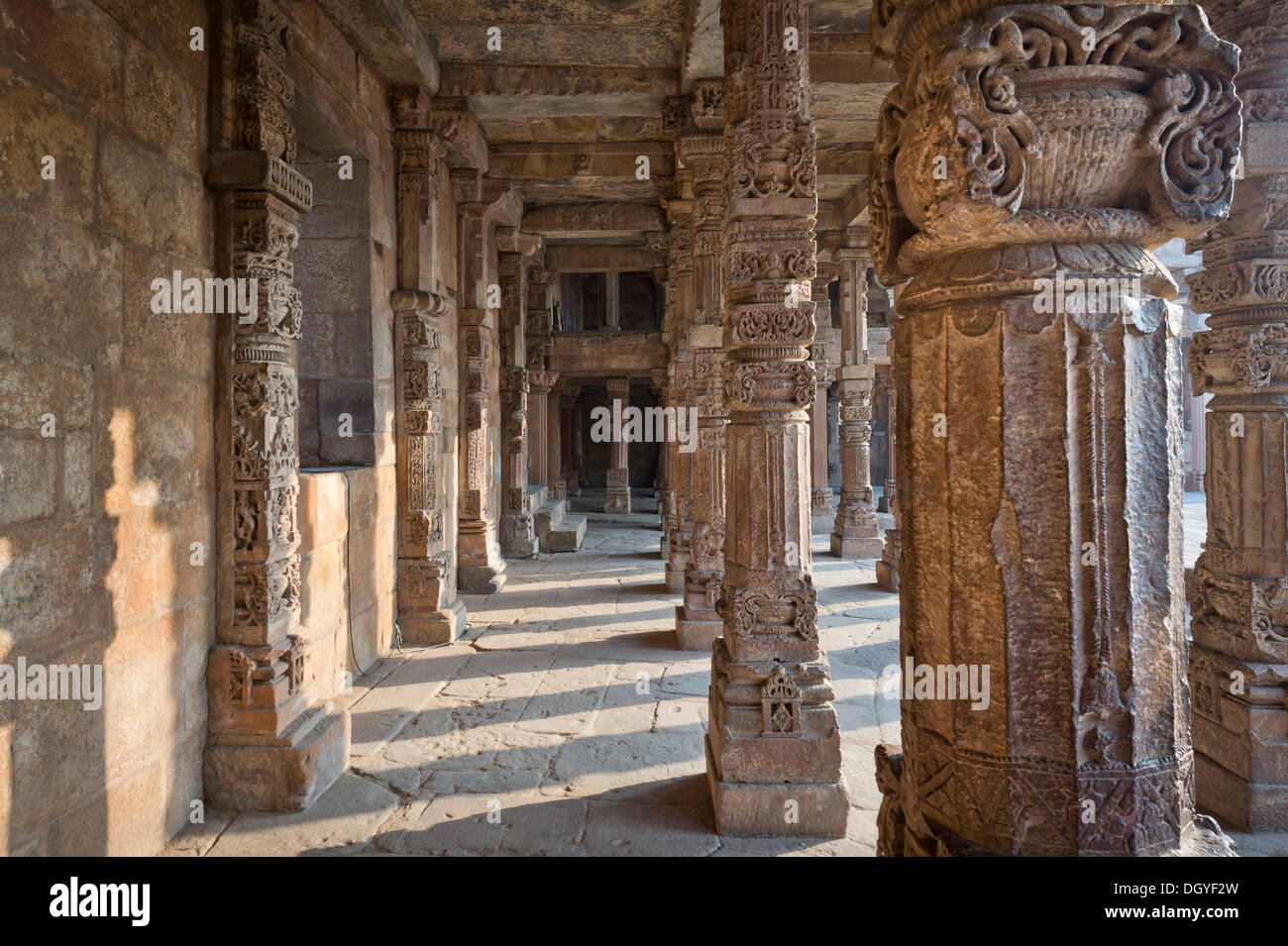 Ornately carved stone columns, Qutb complex, UNESCO World Heritage Site ...