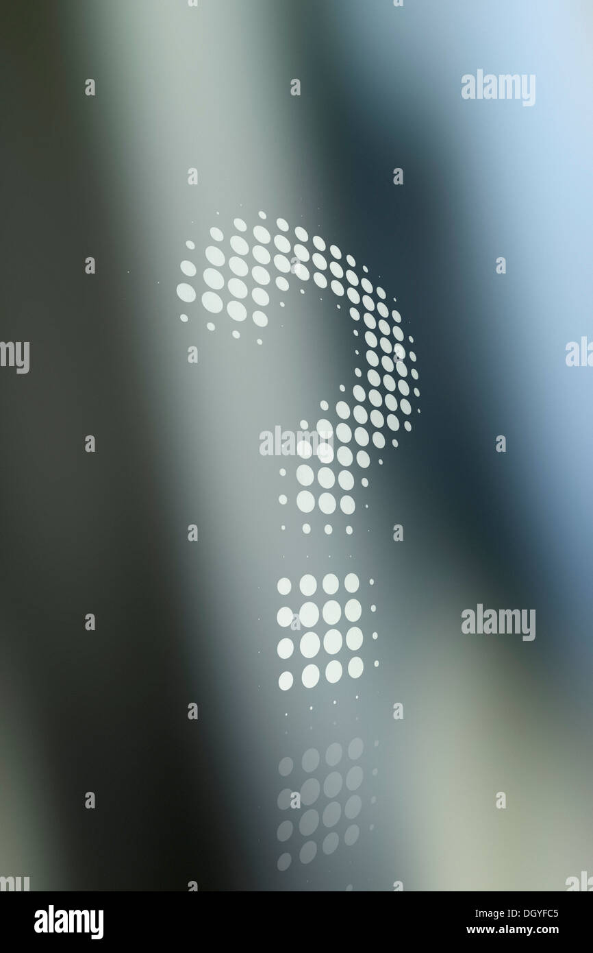 Dot patterned question mark against a background of shadow and light ...
