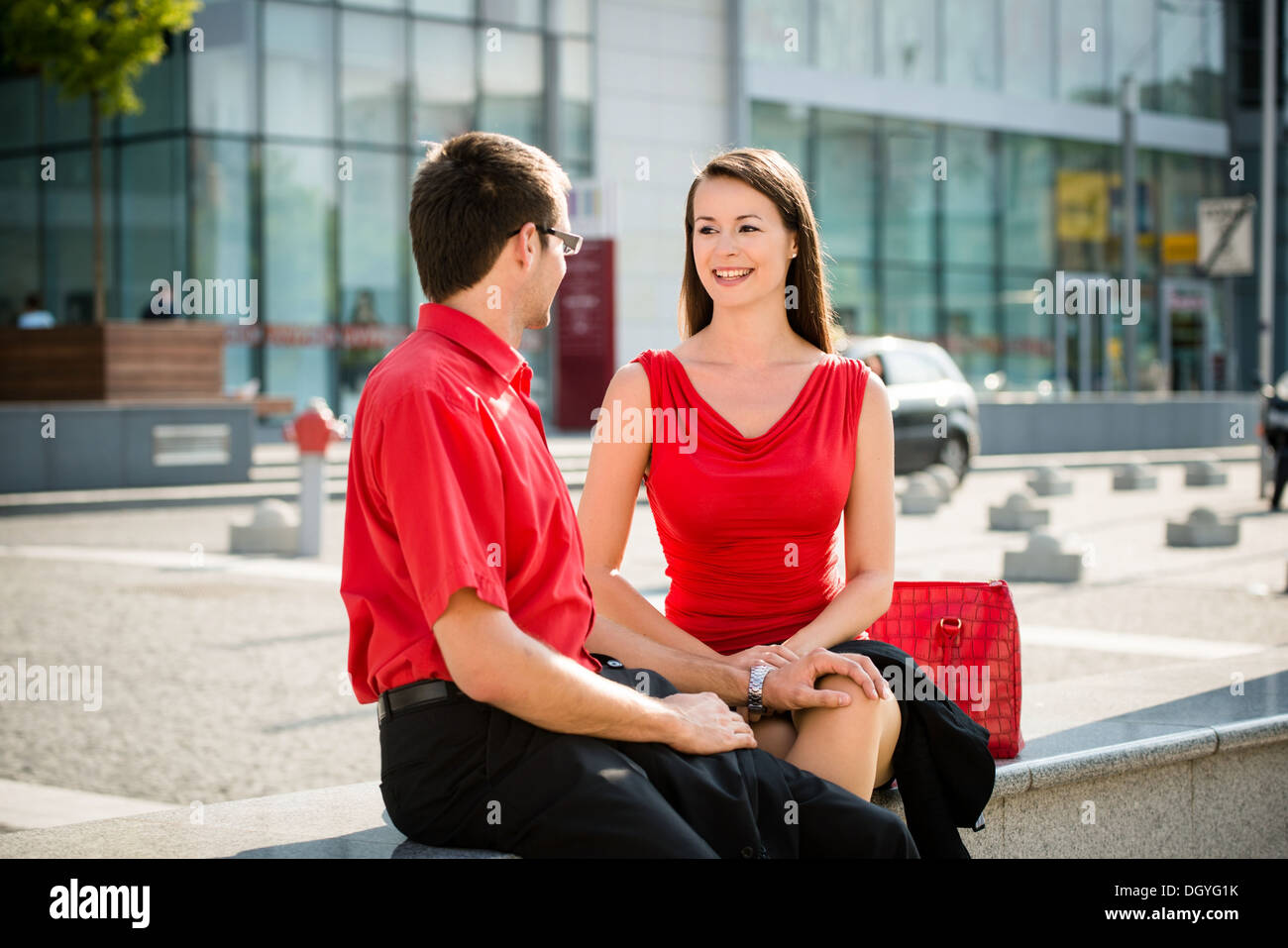 Colleagues - young business people having conversation outdoor in ...