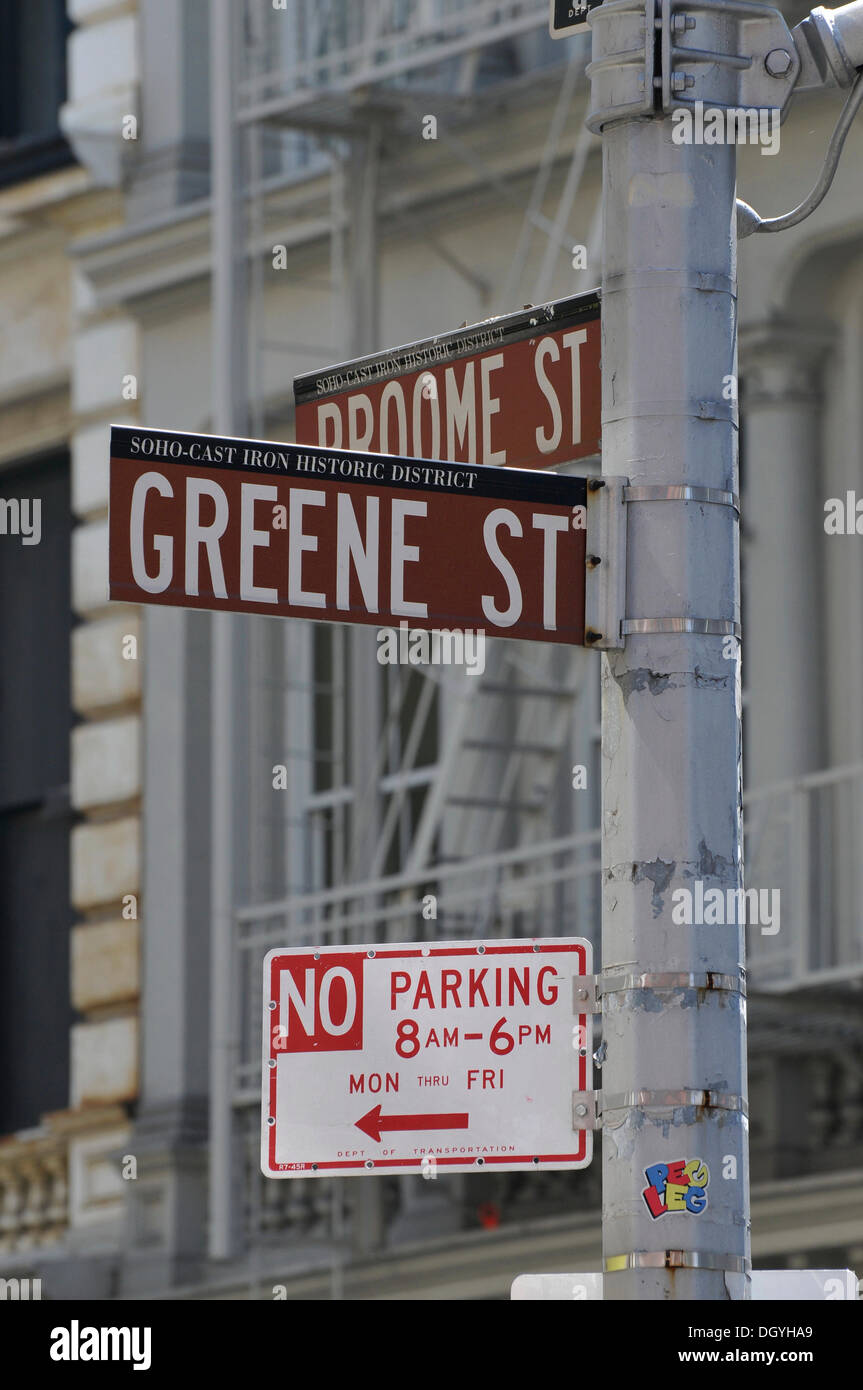 Road signs at intersection, corner of Spring Street and Broome Street ...