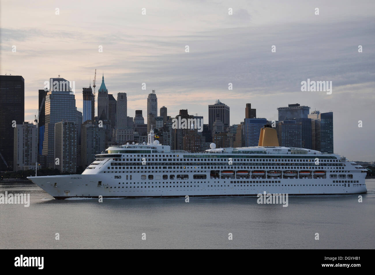 Manhattan skyline with cruise liner at dawn, New York City, New York ...
