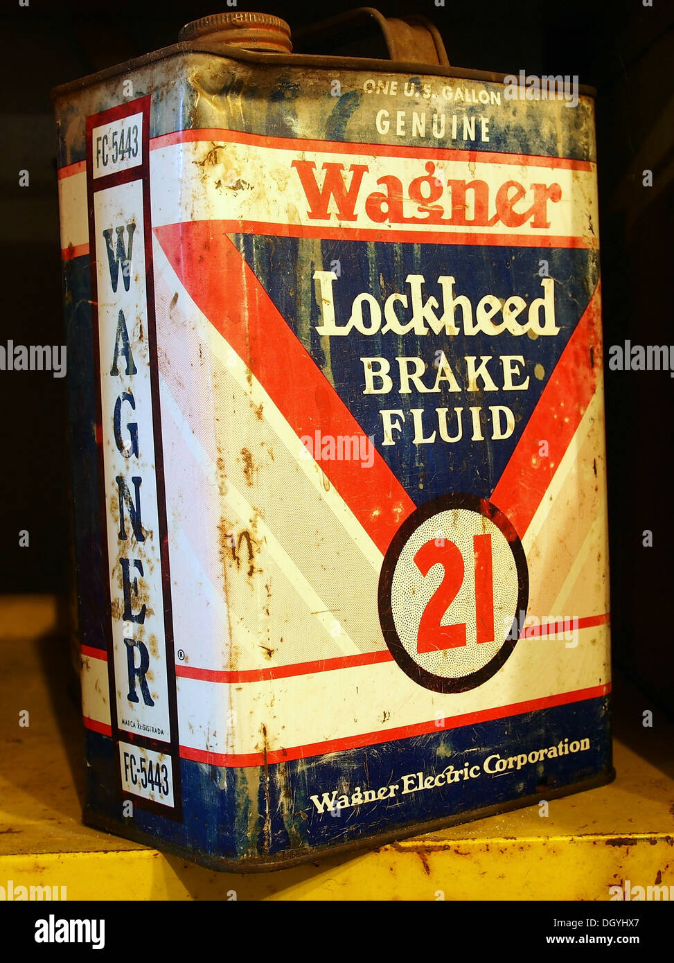 This image features a vintage Wagner Lockheed brake fluid can ...