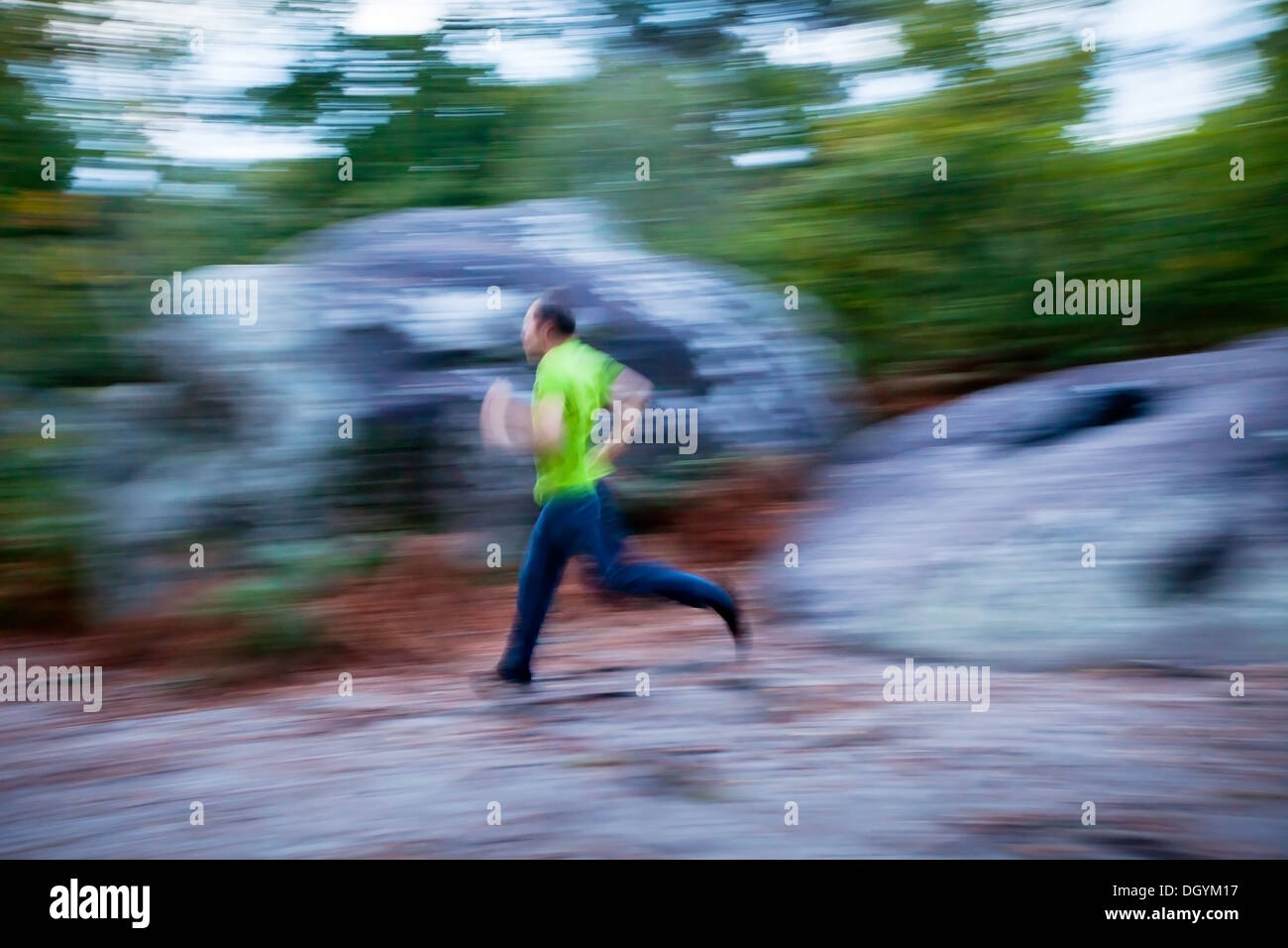 blurred motion, man running outdoors Stock Photo - Alamy