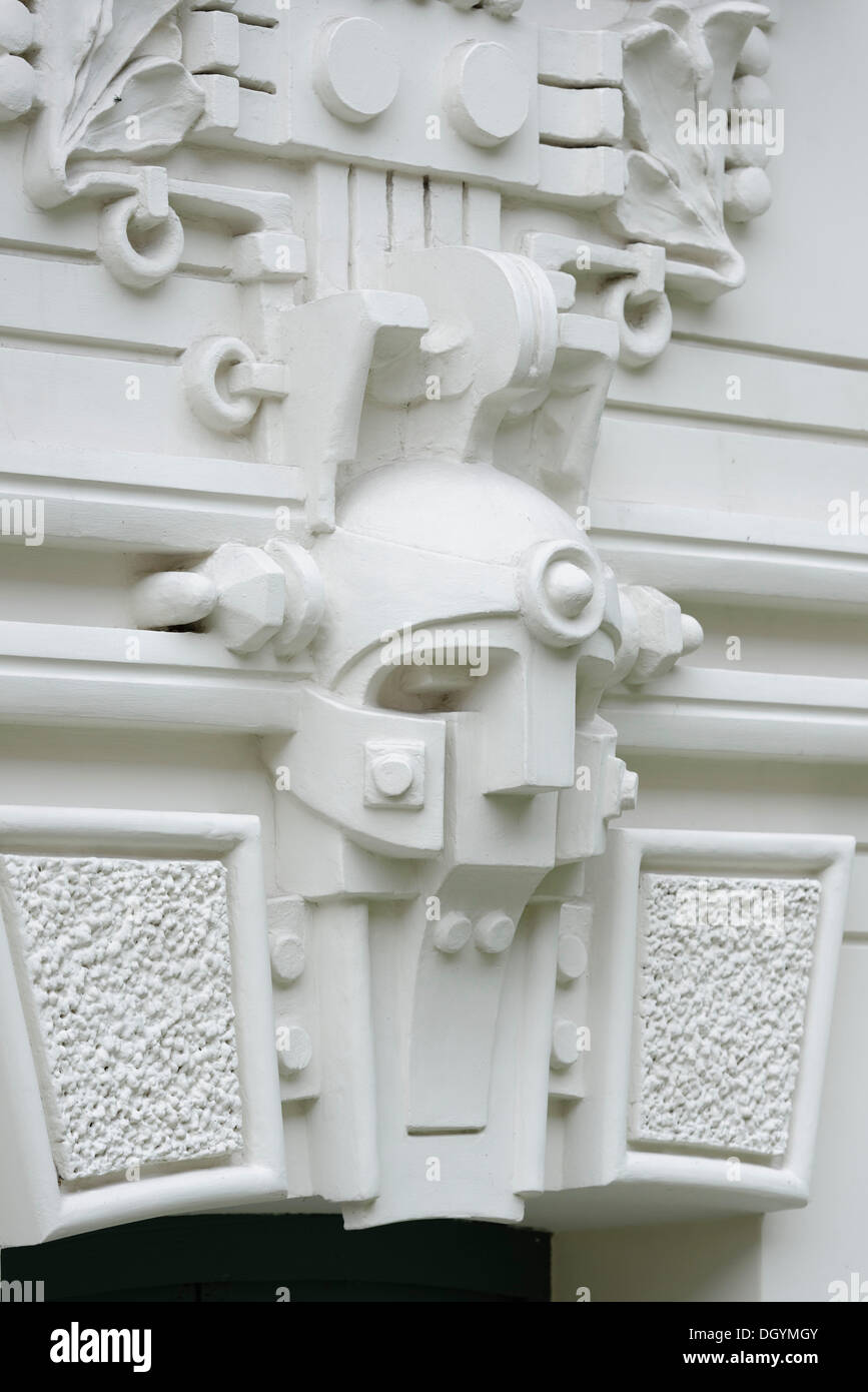 Detail view of an Art Nouveau building, ornaments, head, Stockholm ...