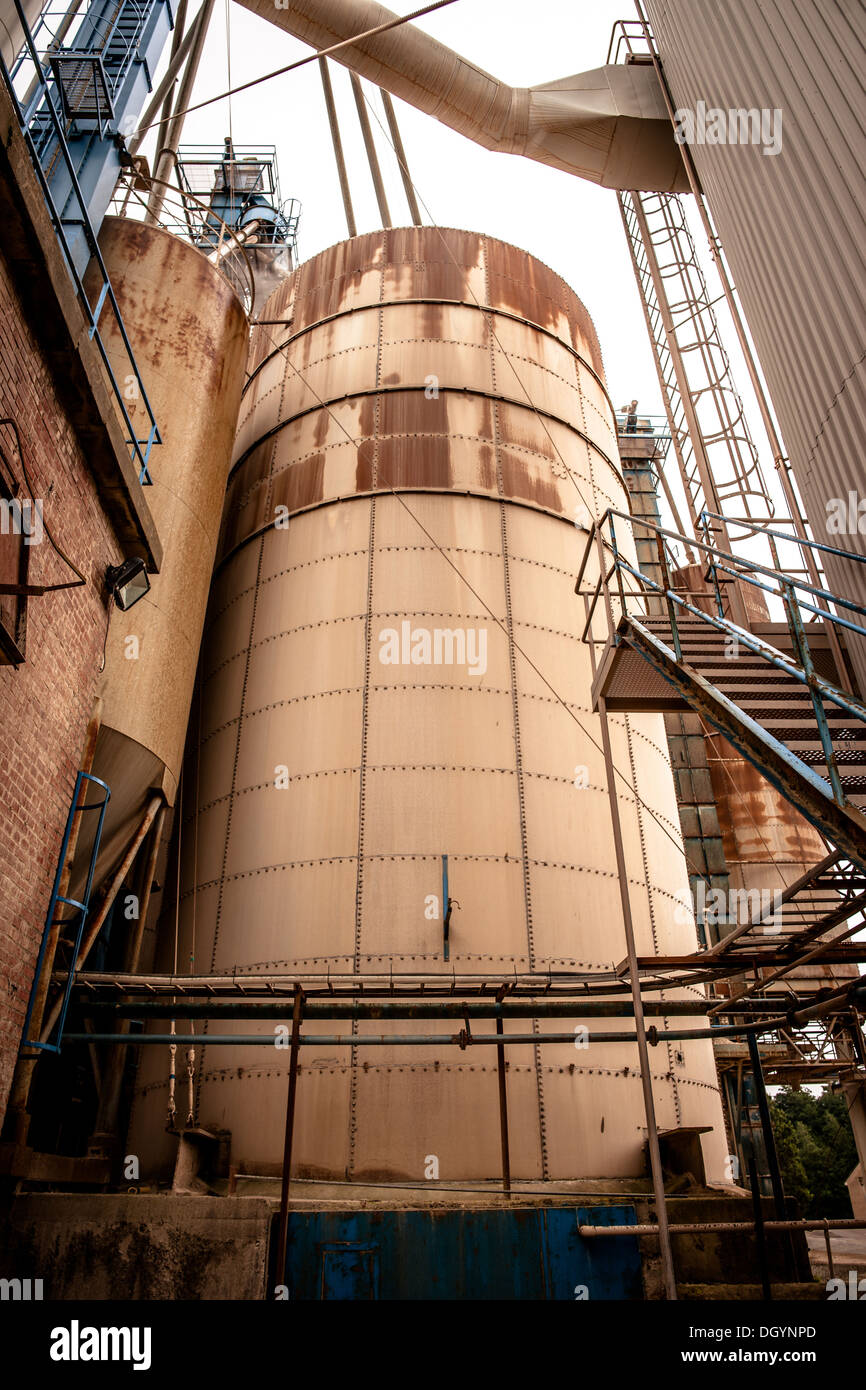 Industrial silos in a old rusty inviroment Stock Photo - Alamy