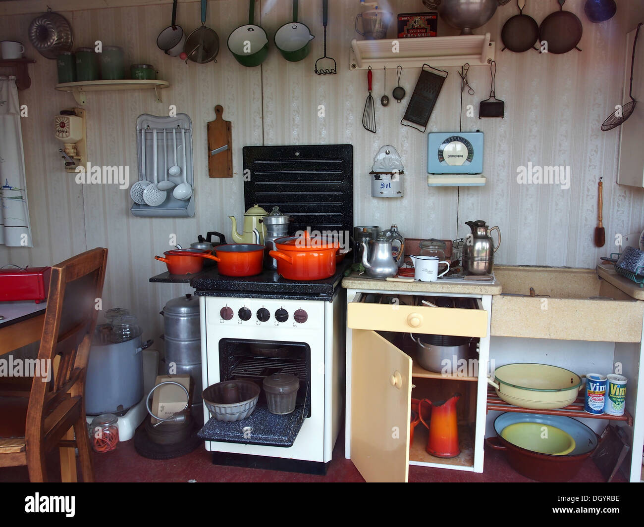 A collection of old Dutch kitchenware, including tins and various ...