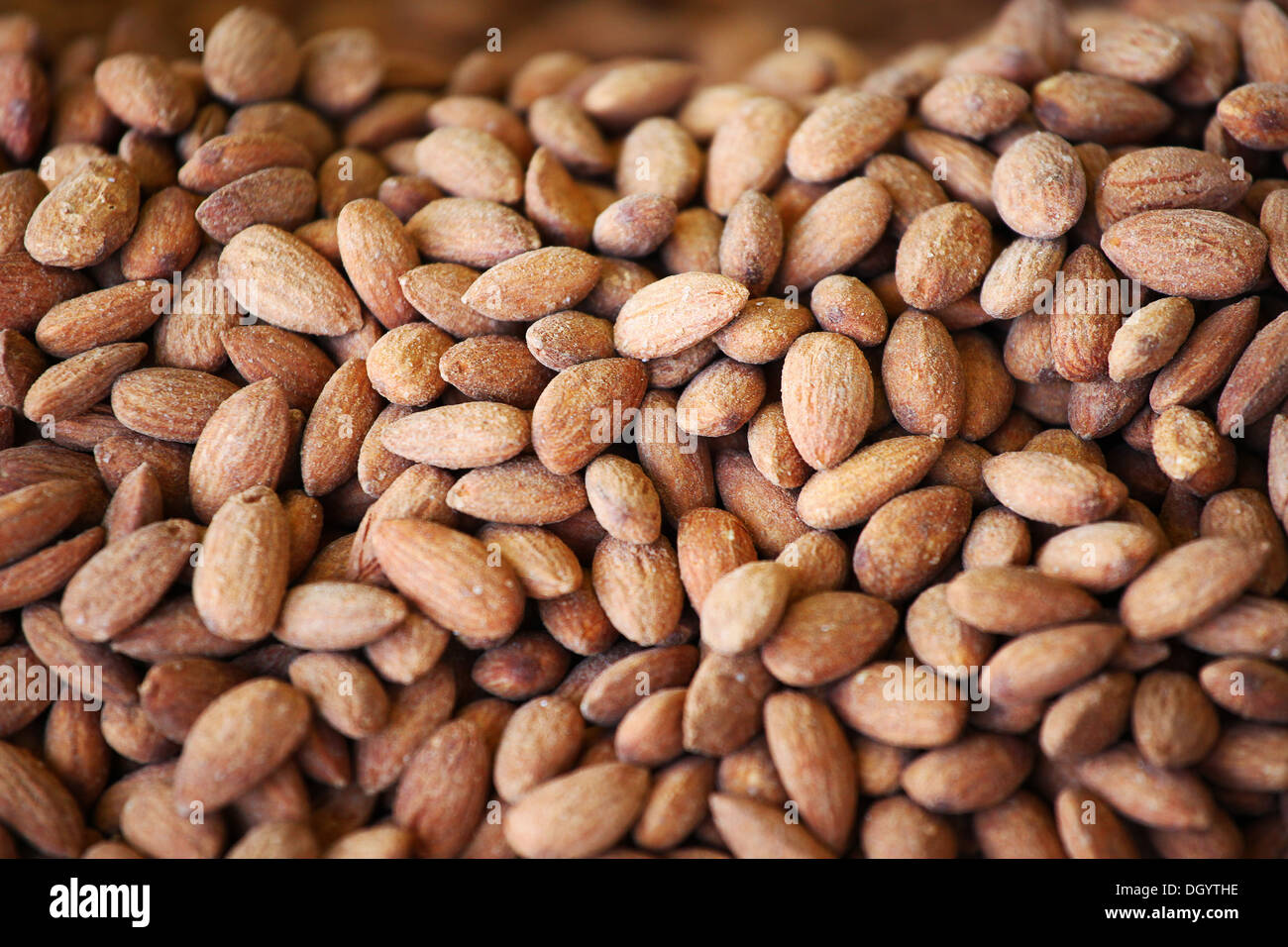 Nuts texture background Stock Photo - Alamy