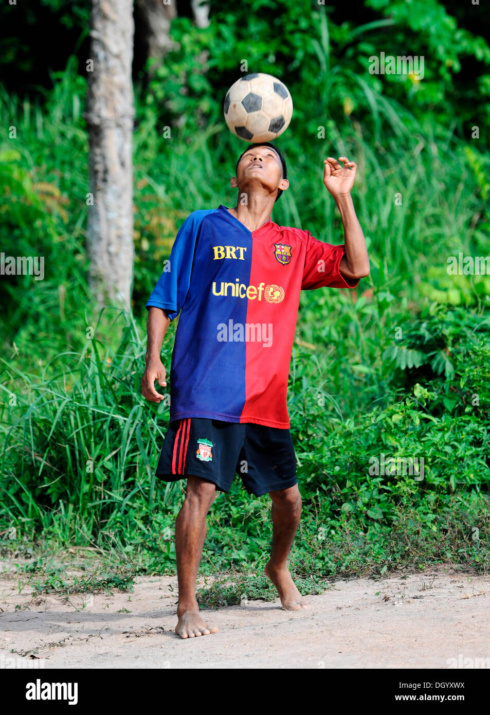 Thai balancing a soccer ball, Thailand, Asia Stock Photo - Alamy