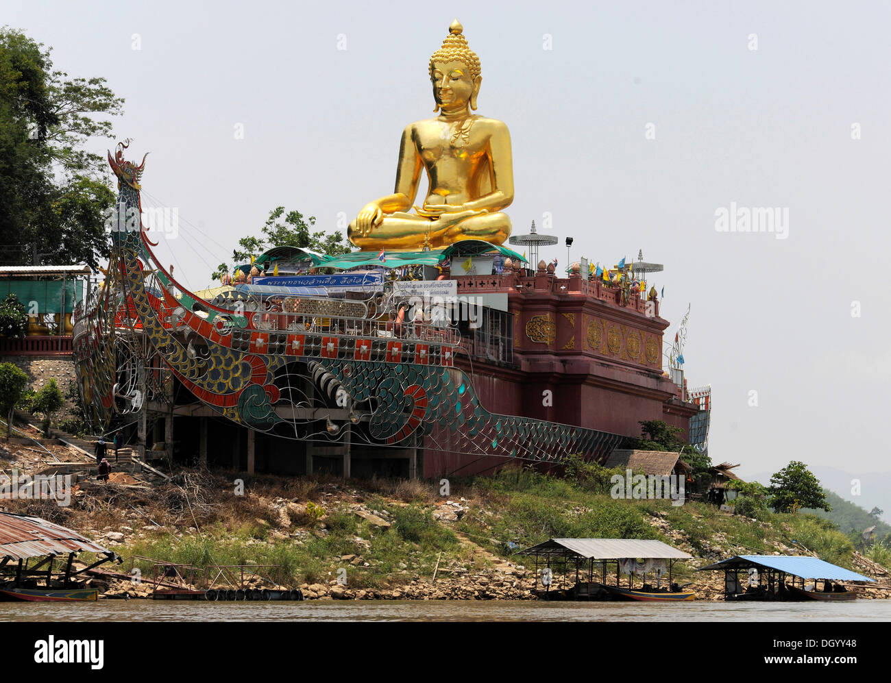 Golden Buddha statue on a boat on the Mekong River, Chiang Rai ...