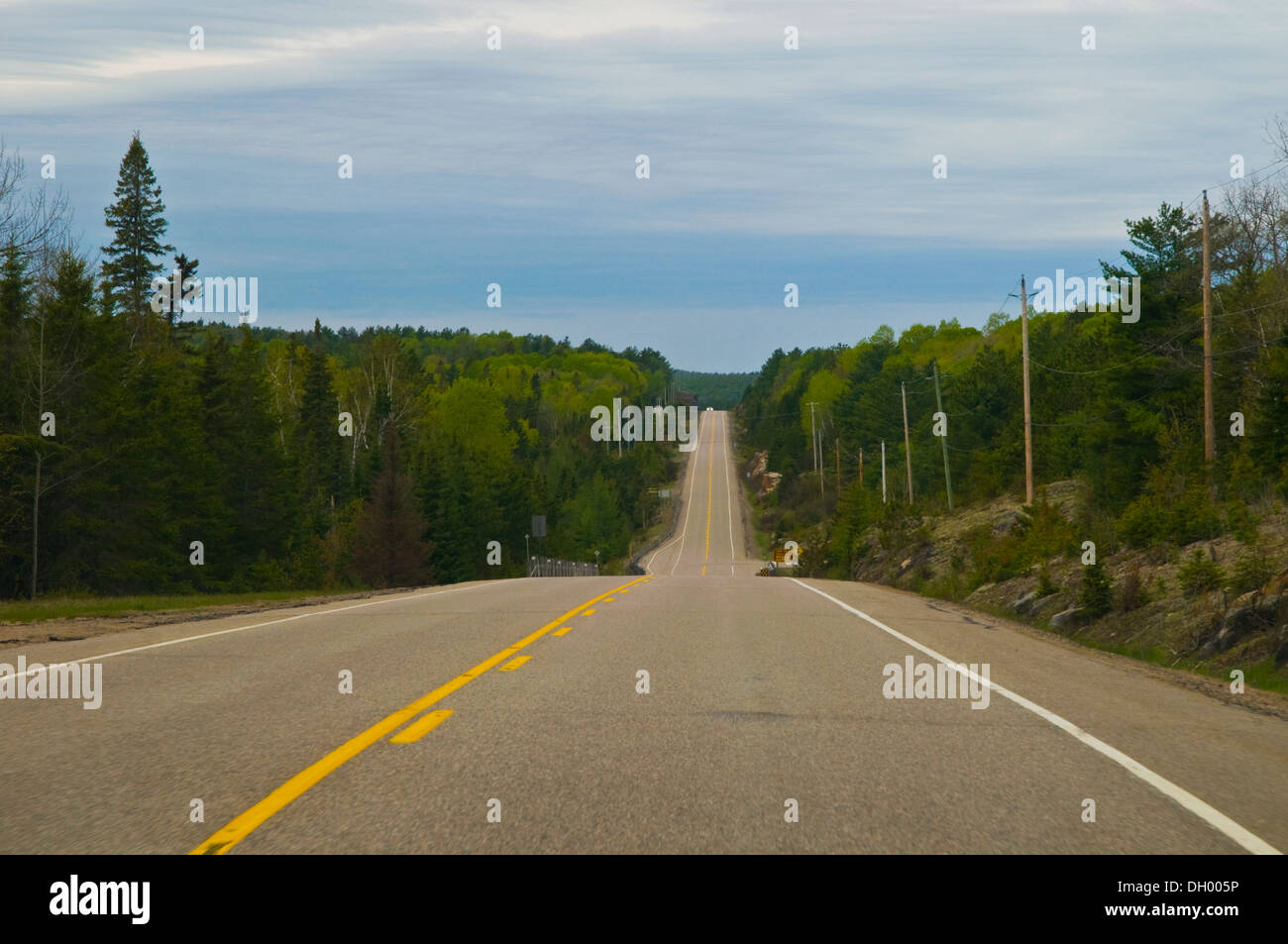A long and empty straight road Stock Photo - Alamy