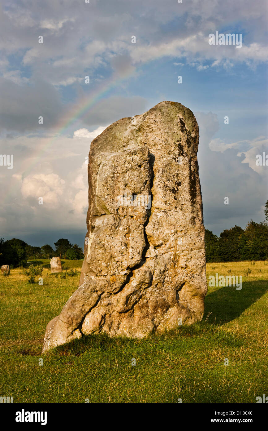 Rainbow over a ring of standing stones, stone circle, Avebury ...