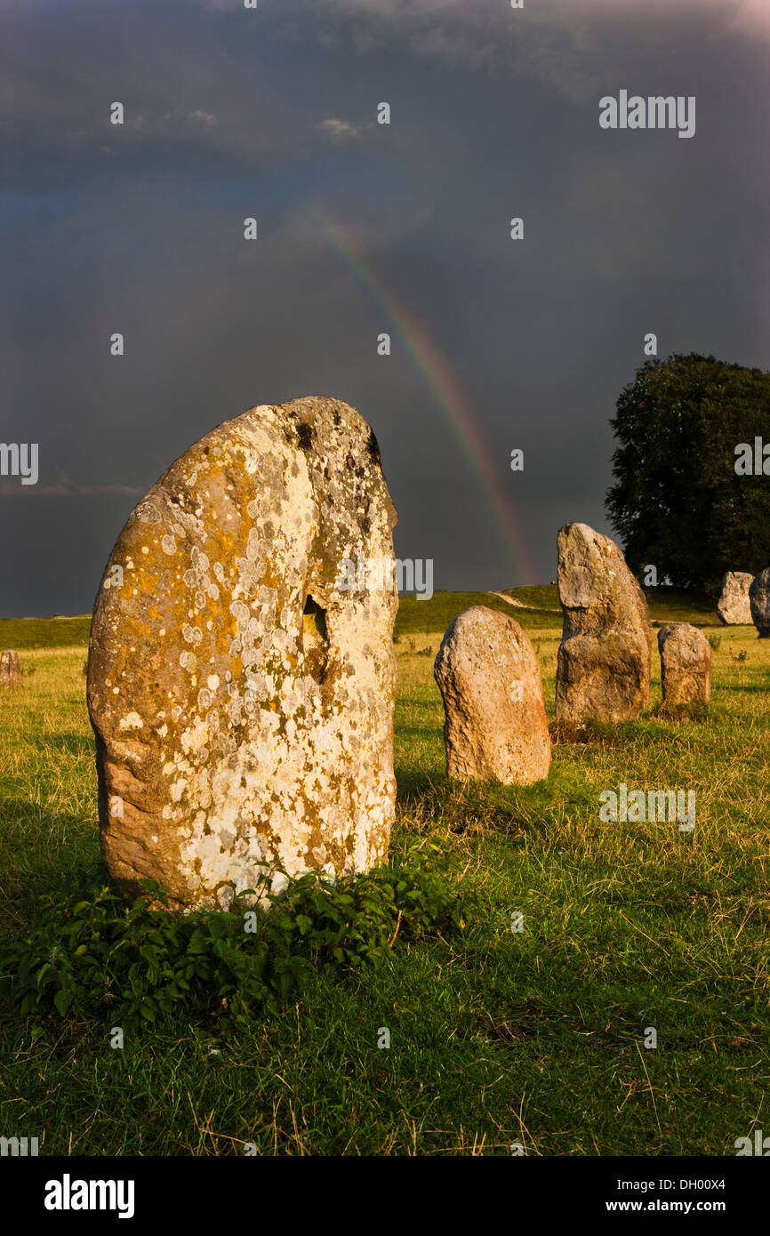 Rainbow over a ring of standing stones, stone circle, Avebury ...