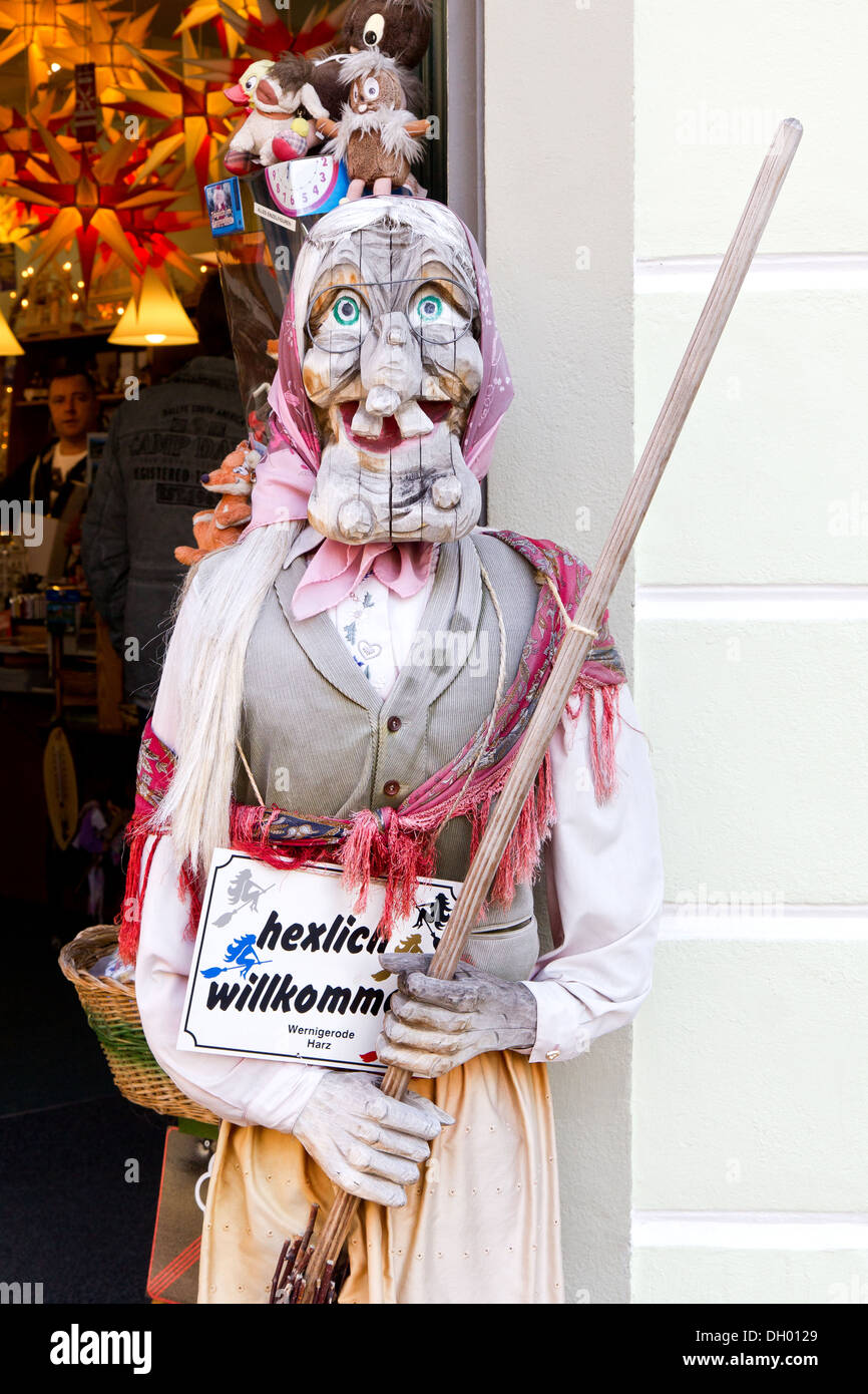 A witch outside a shop at Wernigerode in the Harz, Germany Stock Photo ...