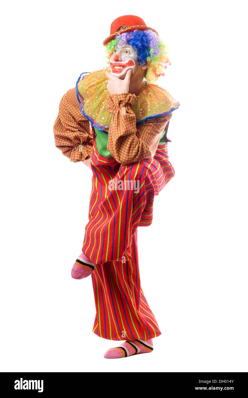 Funny clown standing on one leg. Isolated Stock Photo - Alamy
