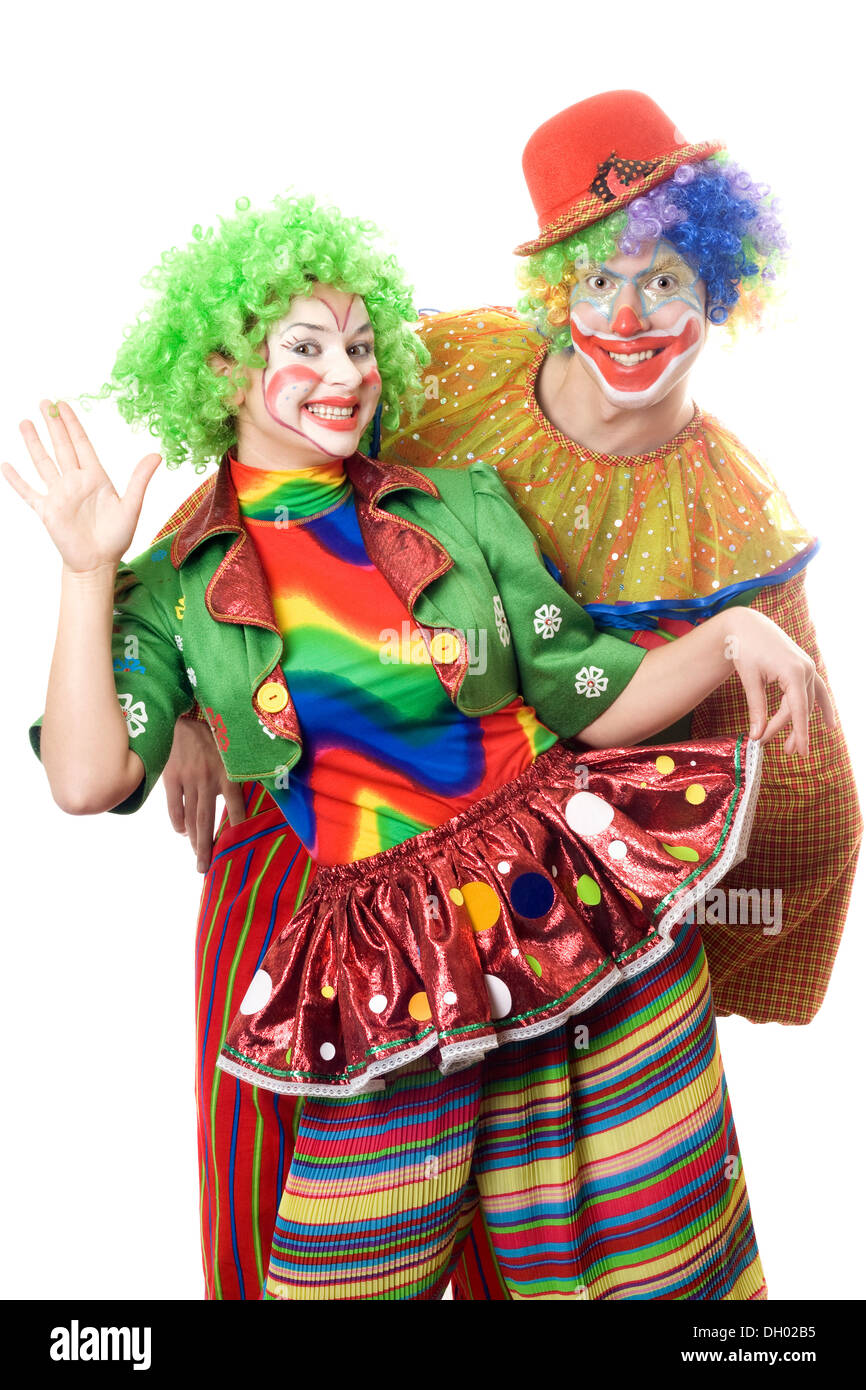 Couple of playful clowns. Isolated on white Stock Photo - Alamy