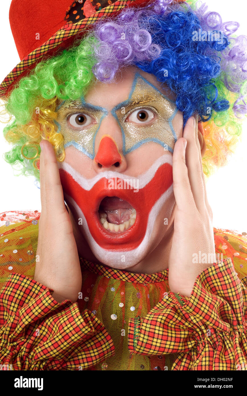 Portrait of a terrified clown. Isolated on white Stock Photo - Alamy