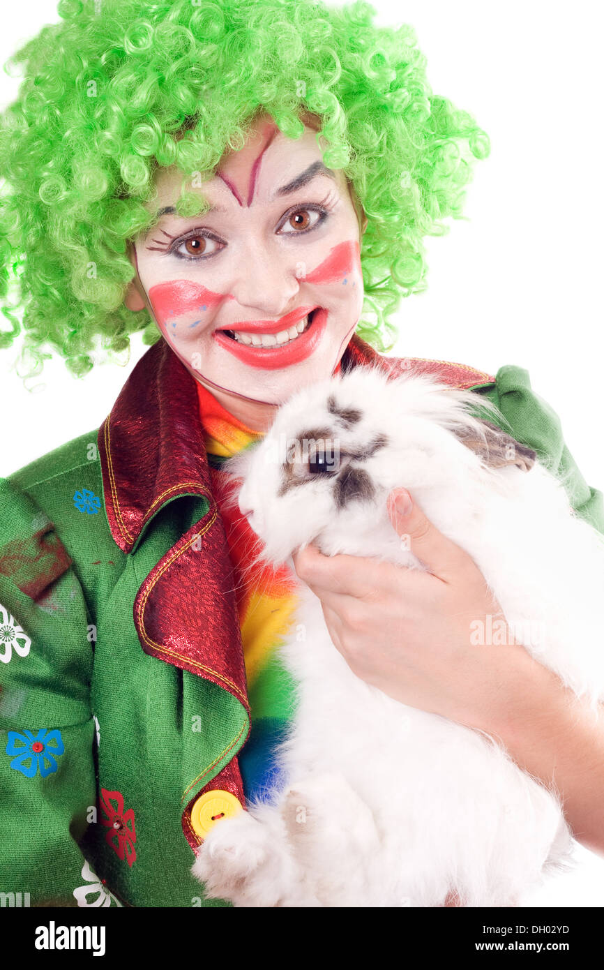 Female clown with a white rabbit. Isolated Stock Photo - Alamy