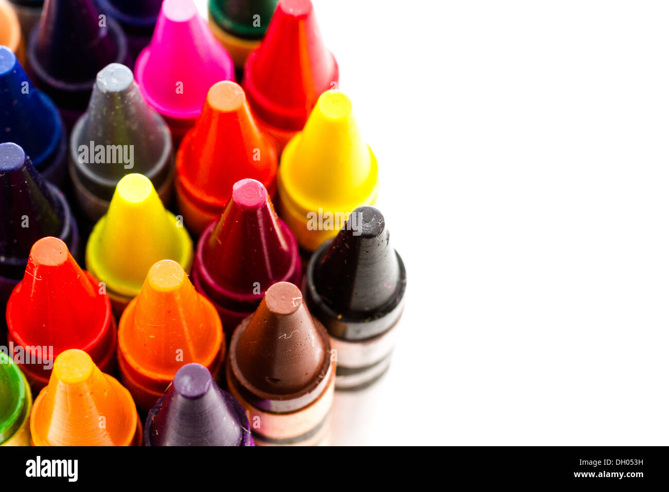 Multicolored crayons on a white background Stock Photo - Alamy