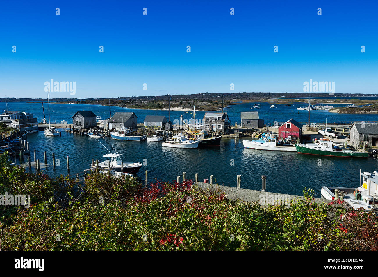 Overview of fishing shacks and boats in the village of Menemsha ...