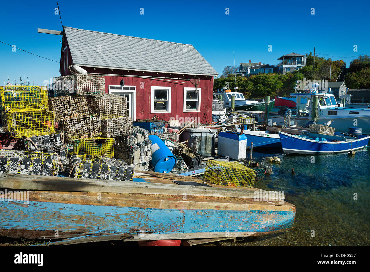 Fishing shack, lobster traps and boats in the village of Menemsha ...