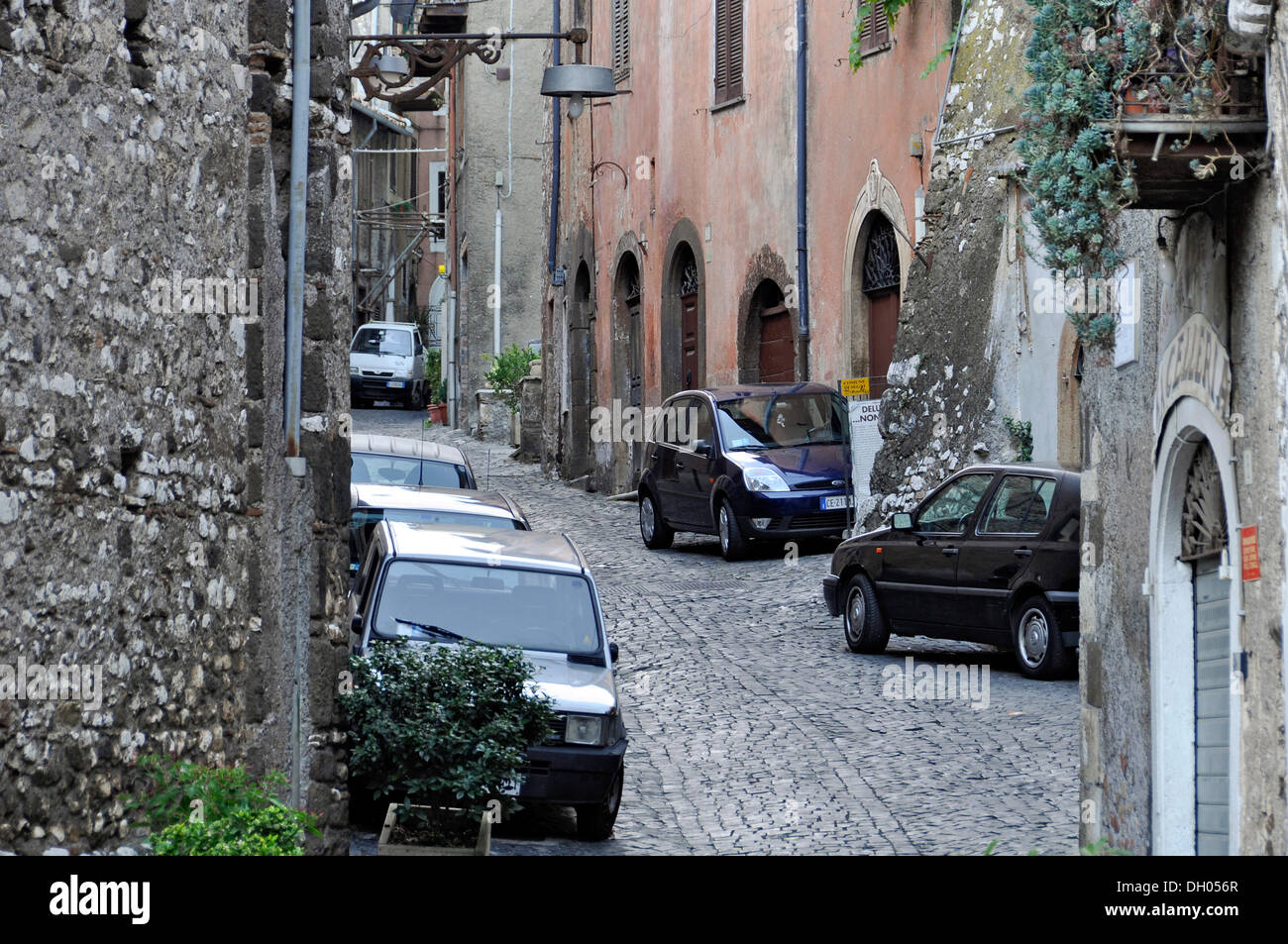 Steep alleyway with parked cars, Segni, Lazio, Italy, Europe Stock ...