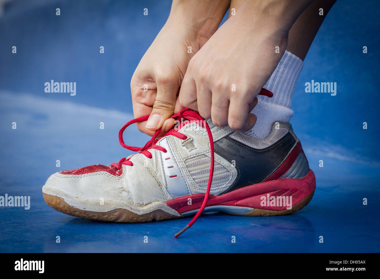 Shoe tying hi-res stock photography and images - Alamy