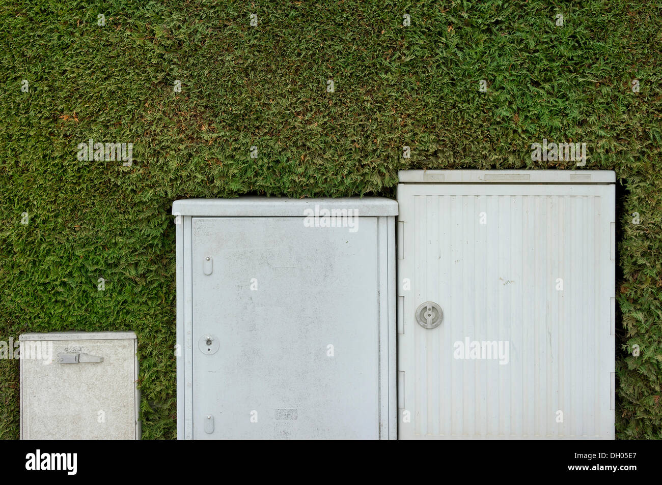 Electrical boxes and Telekom switch boxes in front of a freshly-cut ...