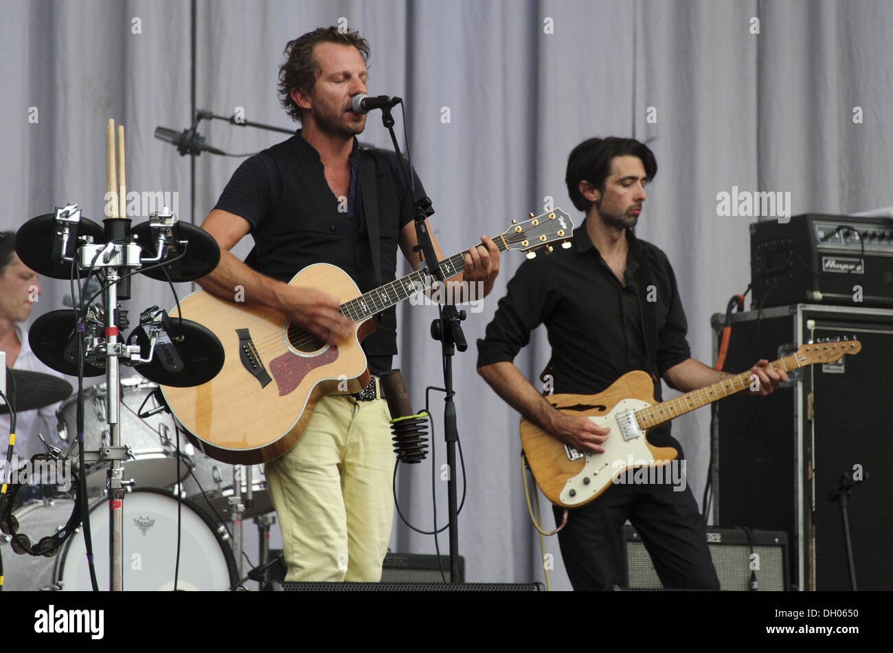 Tom Barman and Mauro Pawlowski of Belgian rock band dEUS performs at A ...