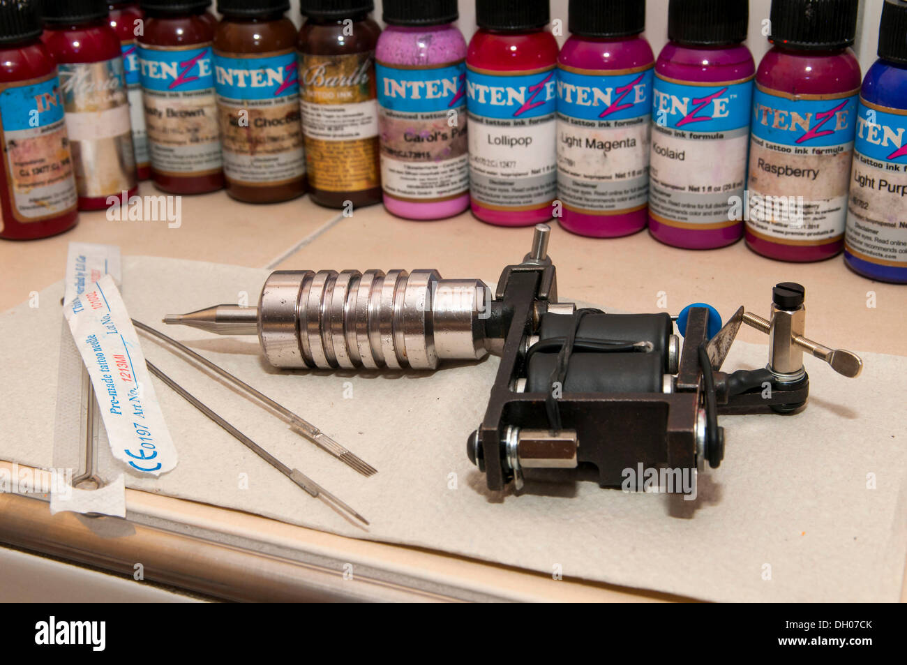 Tattoo inks, a Micky Sharpz Model 007 Iron Hybrid tattoo machine and ...