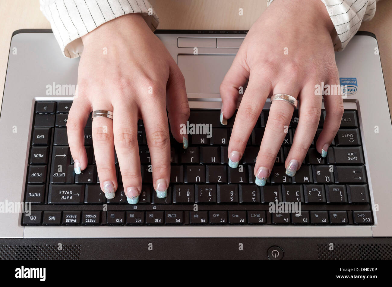 Woman works computer hands close hi-res stock photography and images ...