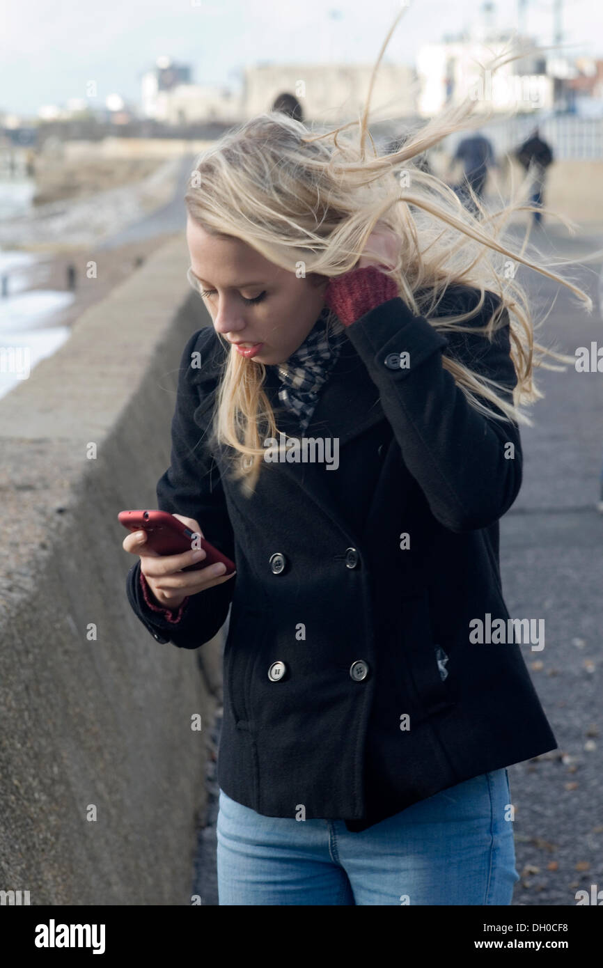 Wind gust woman hi-res stock photography and images - Alamy