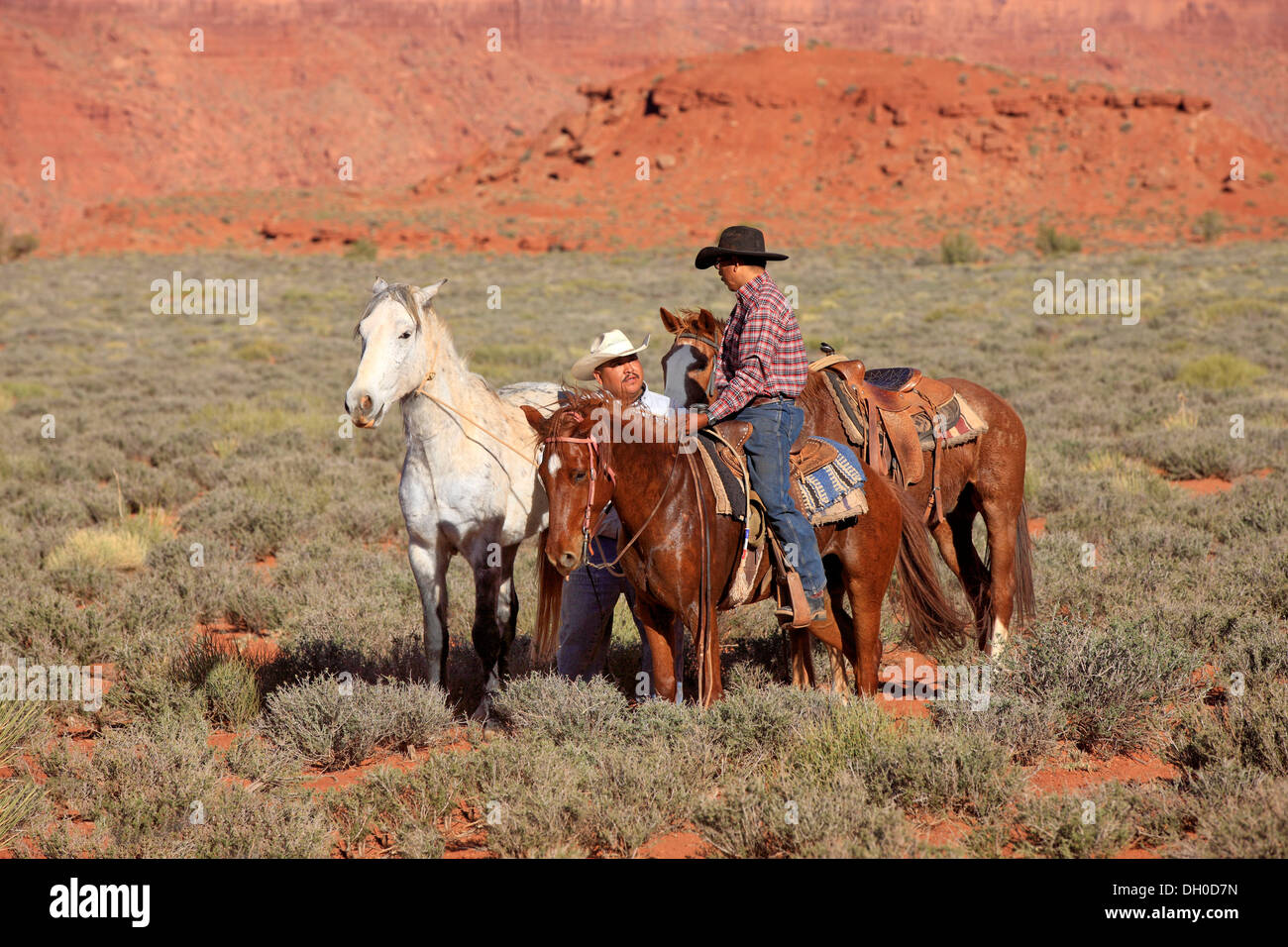 Navajo cowboys with Mustangs, Utah, United States Stock Photo - Alamy