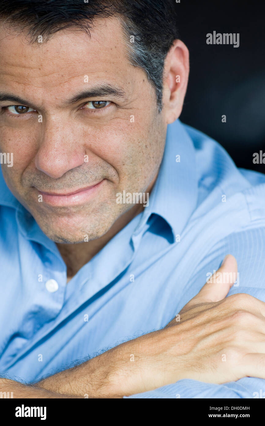 Hispanic man smiling Stock Photo - Alamy