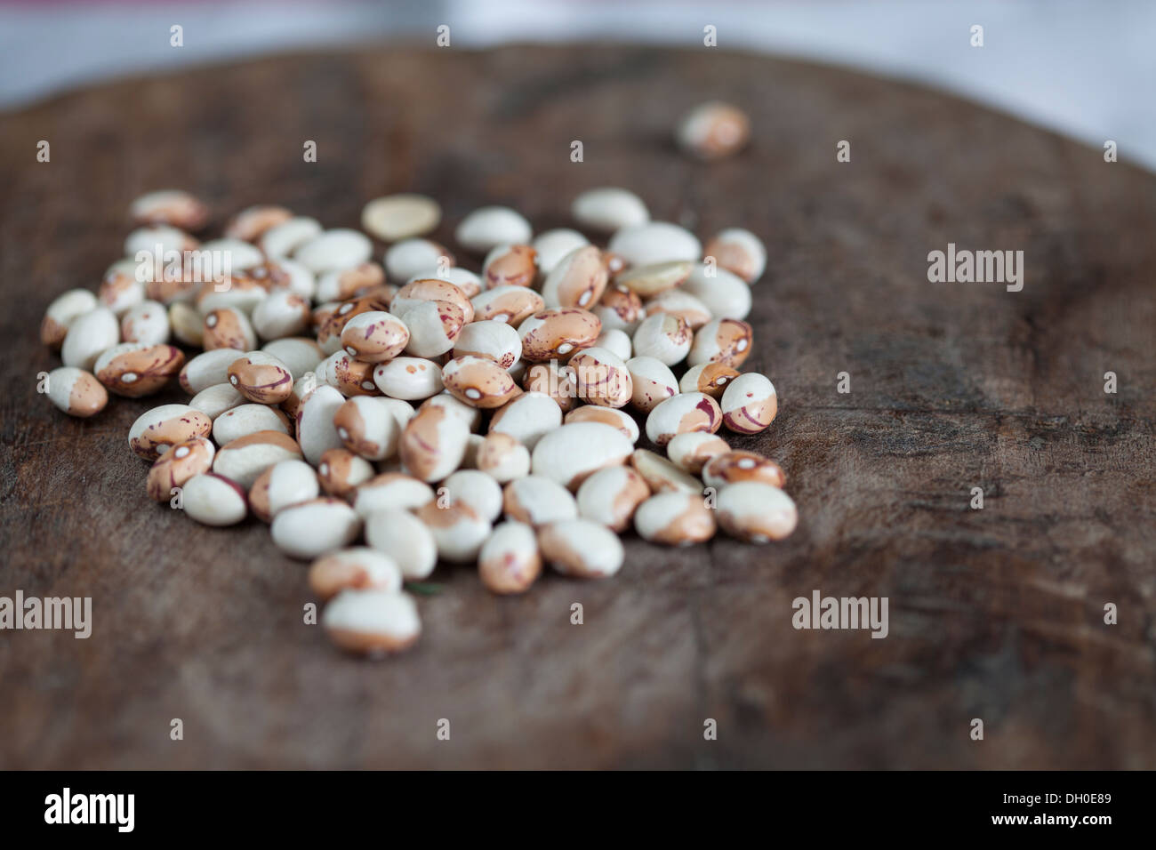 Dried sugar beans on dark wooden board Stock Photo - Alamy