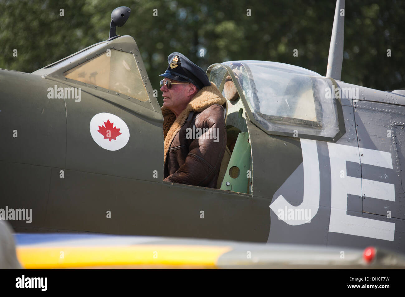 Pilot in cockpit of Supermarine Spitfire single seat fighter aircraft ...