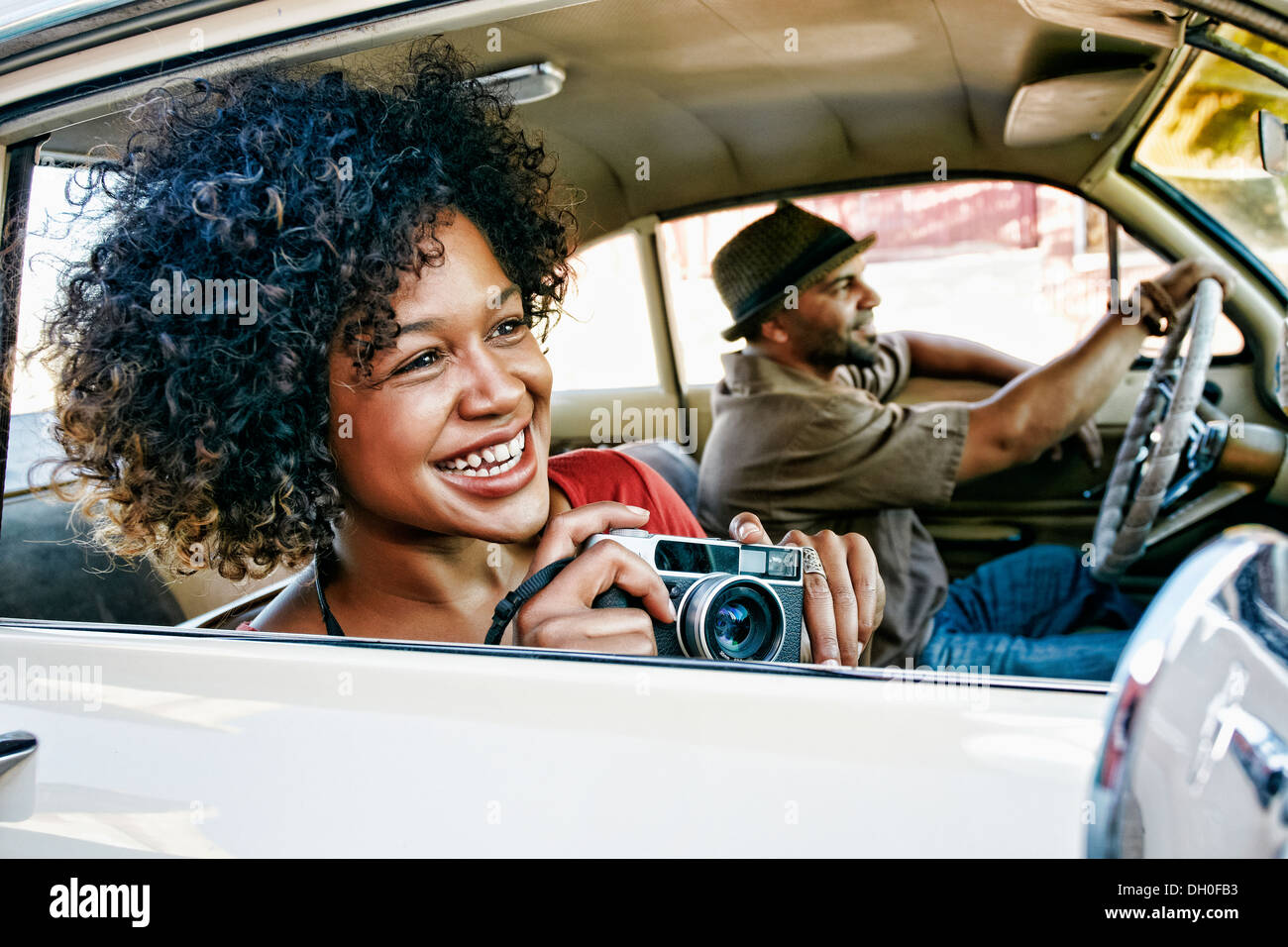 Couple driving vintage car hi-res stock photography and images - Alamy