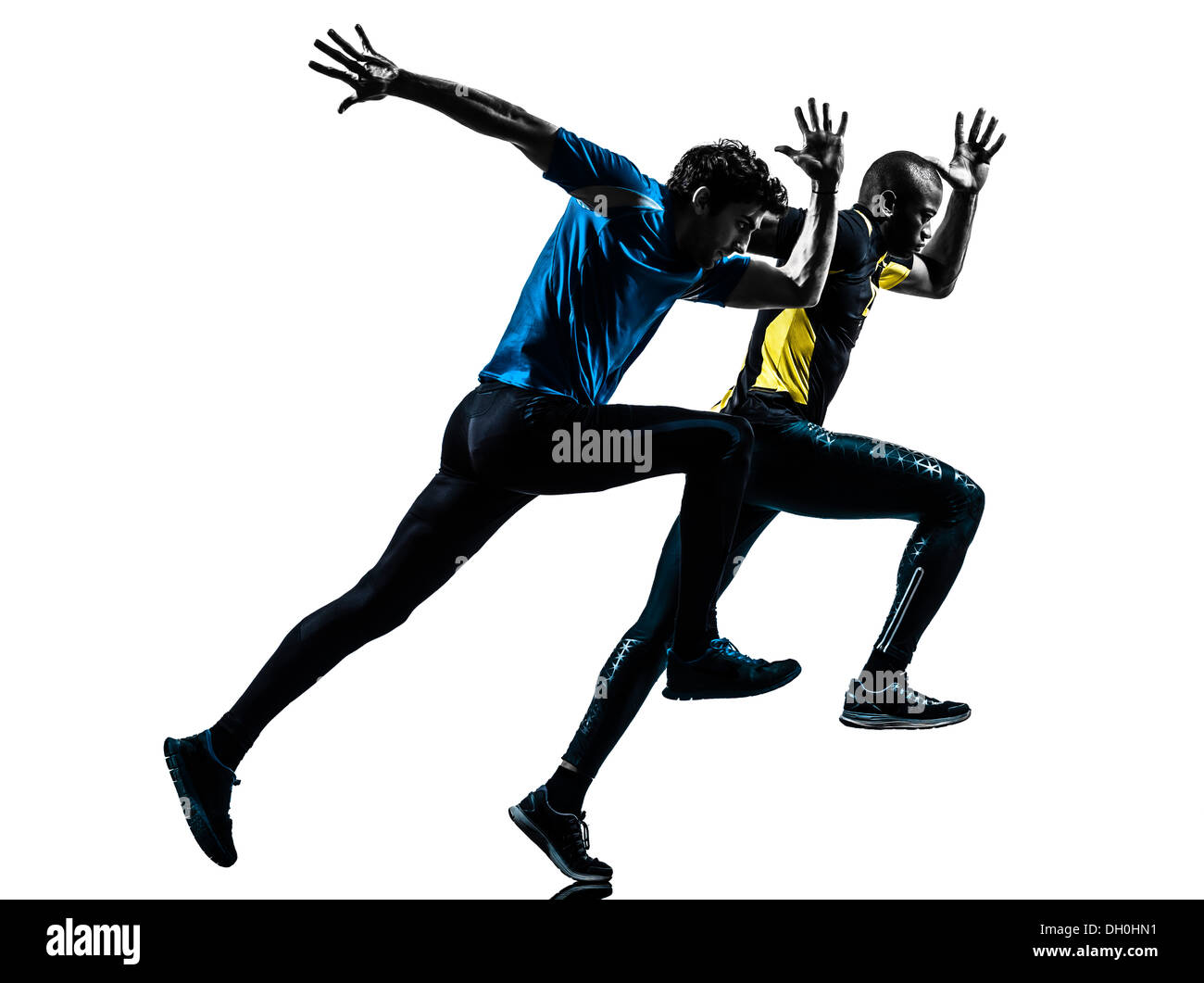two men racing running sprinting in silhouette studio isolated on white ...