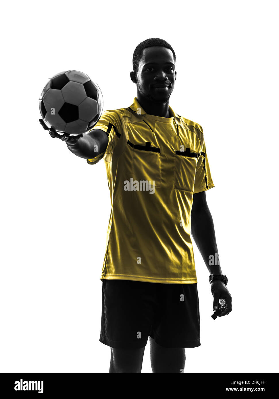 one african man referee standing holding showing football in silhouette ...