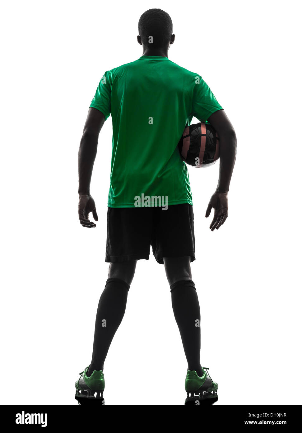 one african man soccer player green jersey rear view holding football ...
