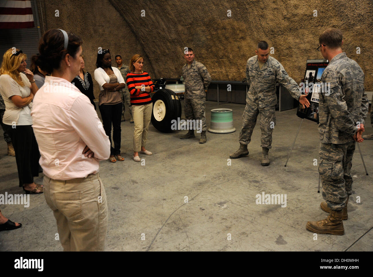 Military spouses receive a mission brief on airfield battle damage ...