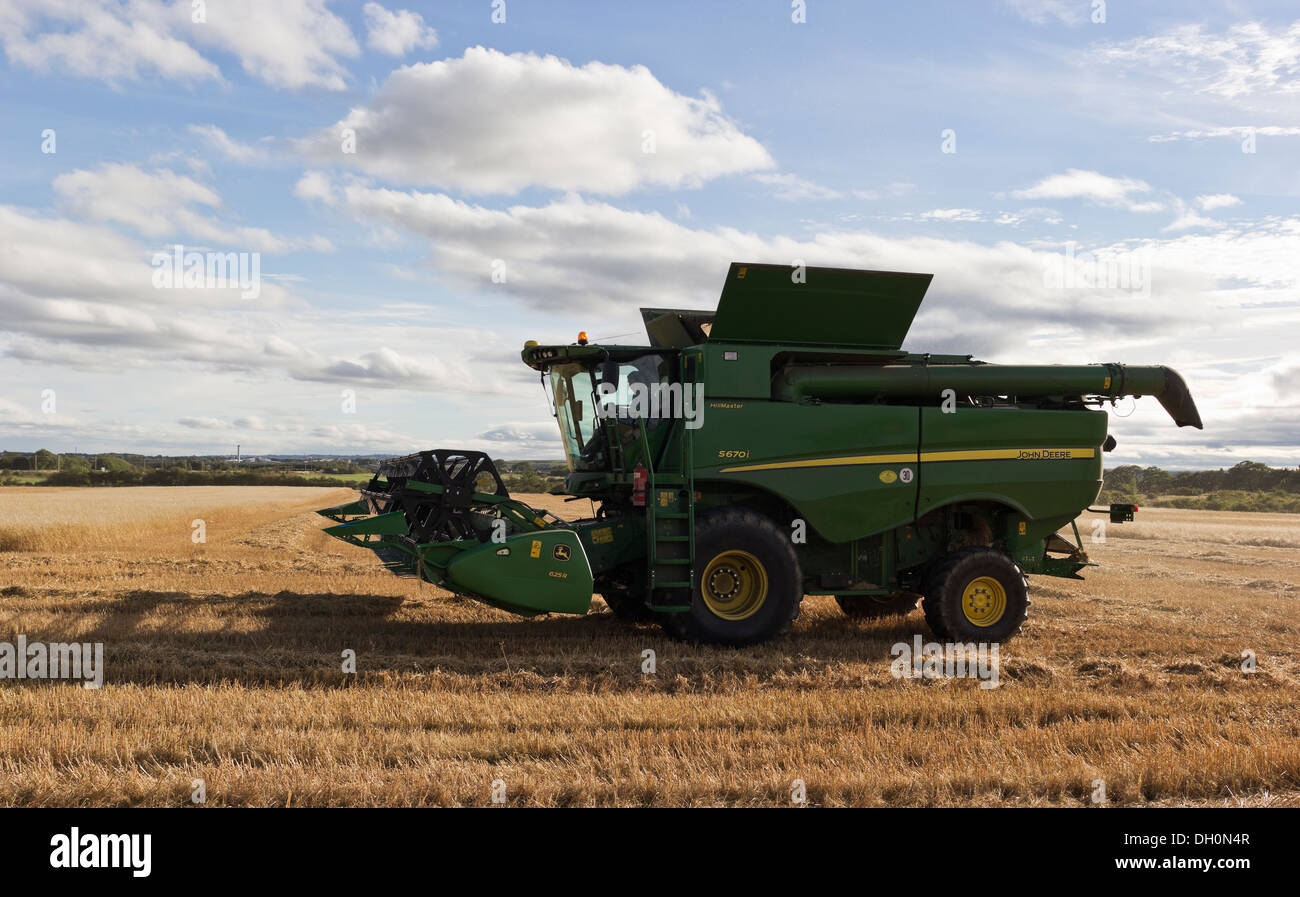 John Deere Combine Harvester Harvesting Wheat High Resolution Stock ...