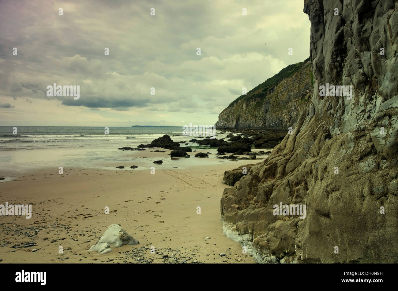 A rocky part of the beach at Pendine Sands in South Wales Stock Photo ...