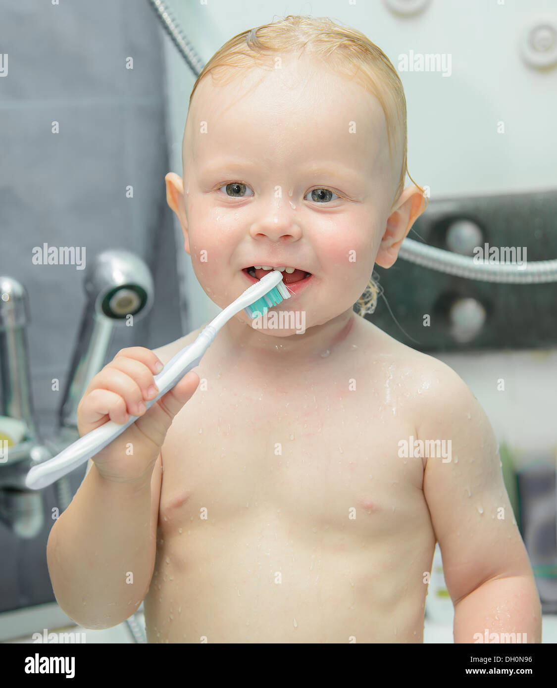 baby boy brushing his teeth Stock Photo - Alamy