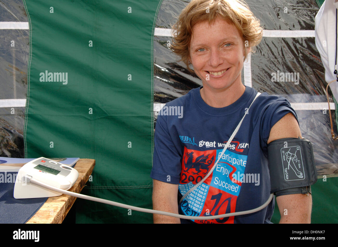 An athlete having blood pressure taken before the Bupa marathon in ...
