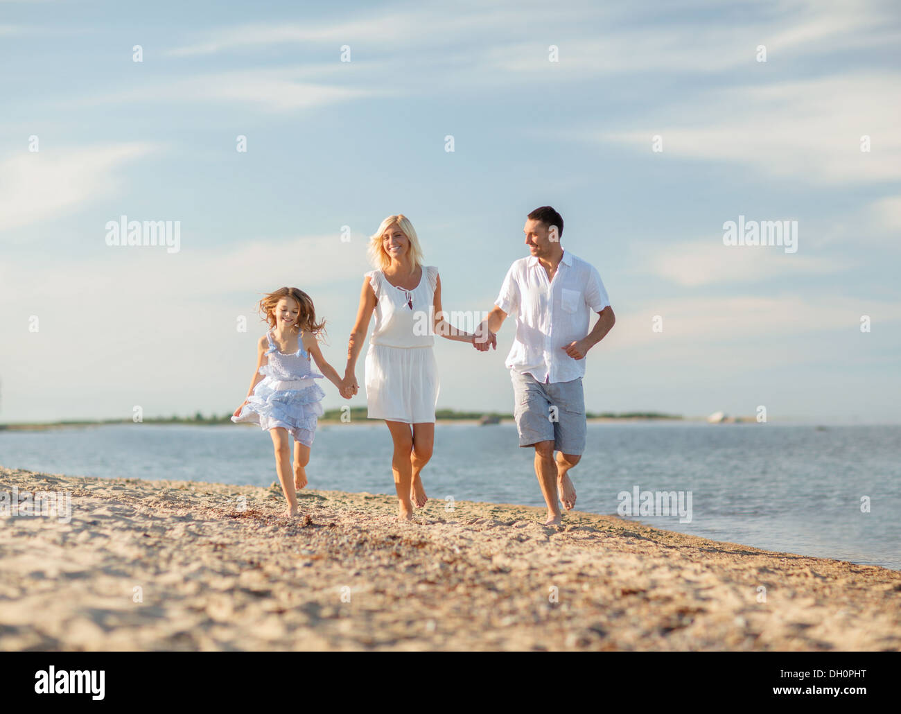 happy family at the seaside Stock Photo - Alamy